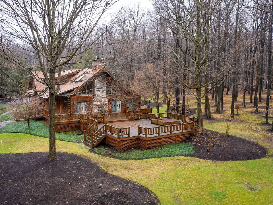 Luxurious Custom-Built Log Home Estate on 64.9 Acres – TrendsNews99